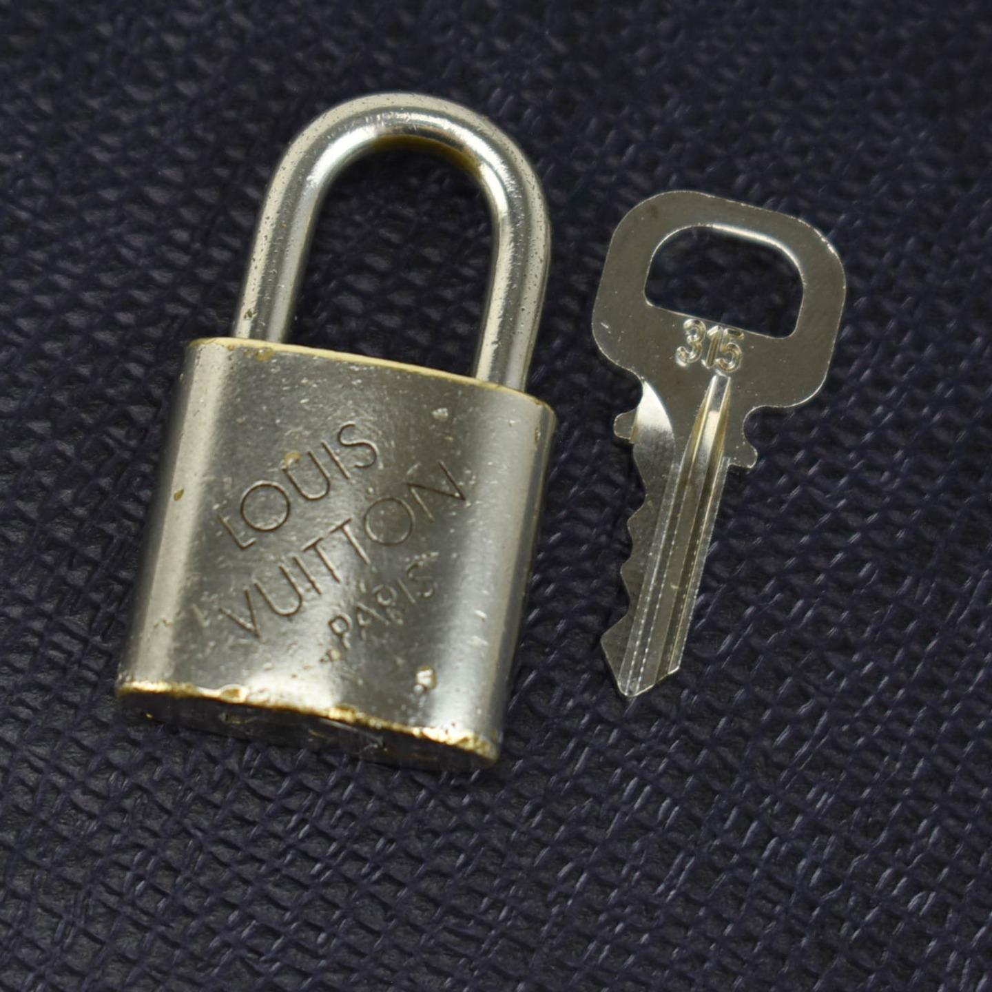 Vintage Louis Vuitton Lock Necklace Silver Sneakers | semashow.com